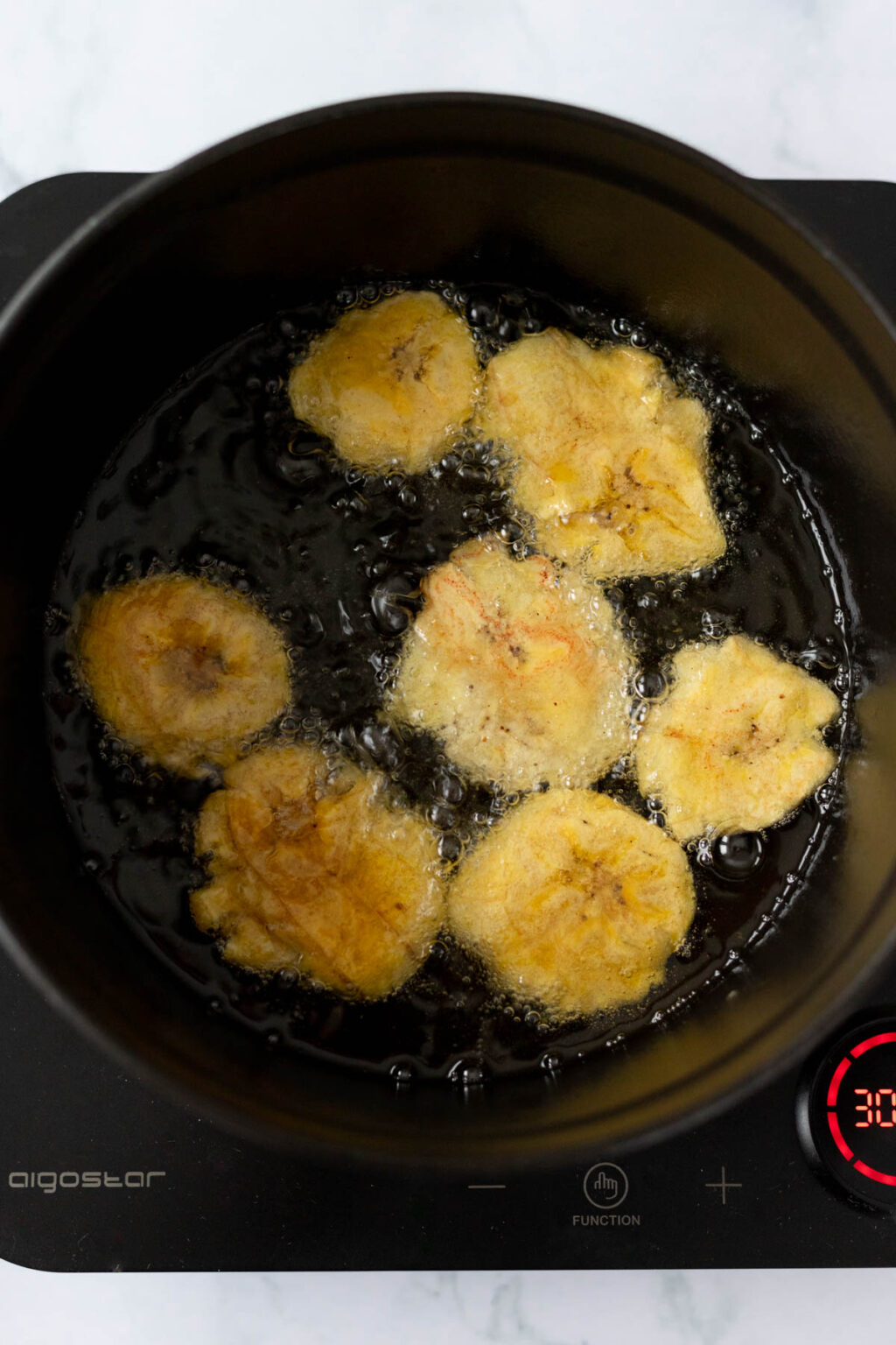 How to Make Tostones (Platanos Fritos)